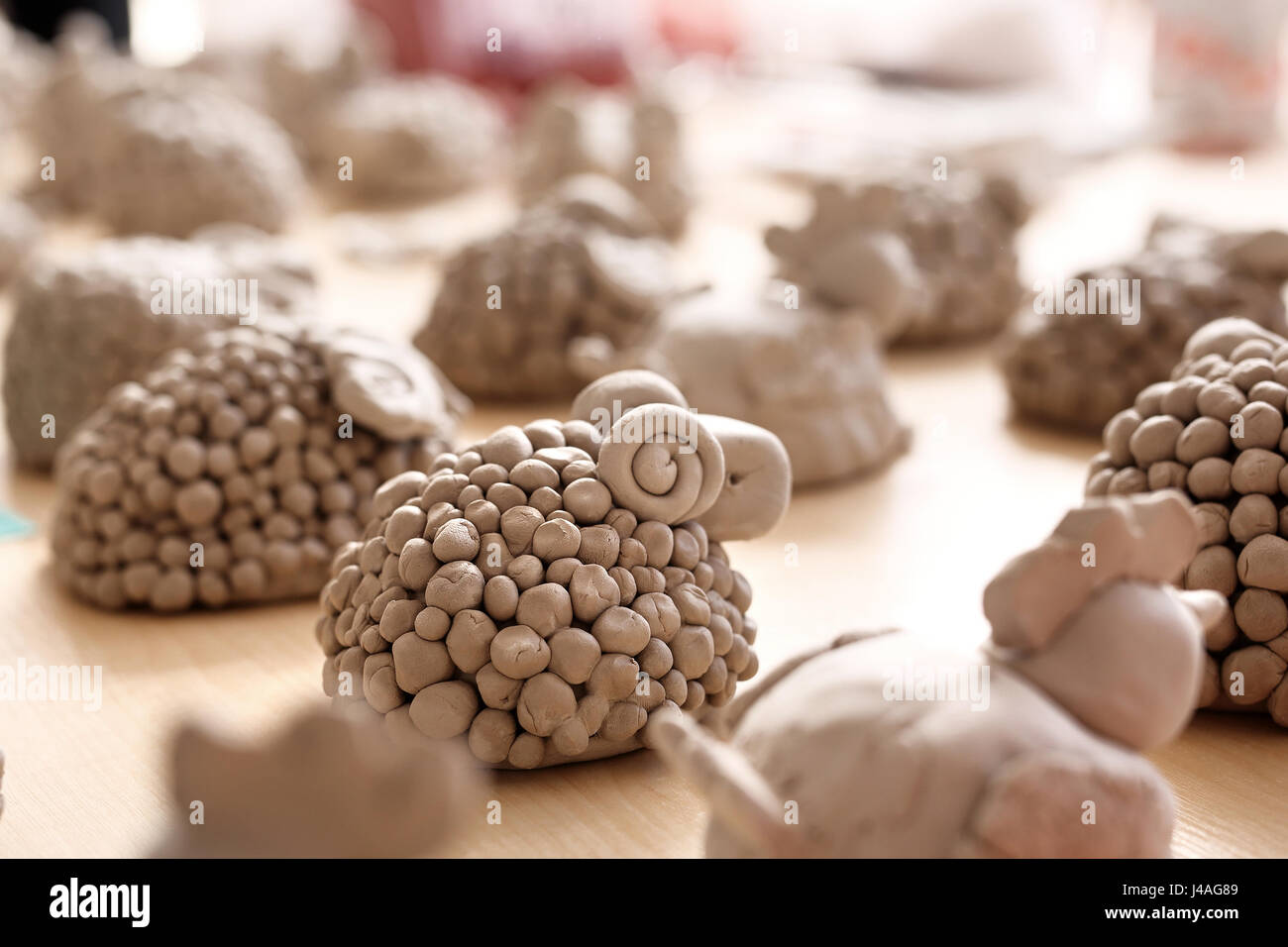 Workshop of artistic ceramics. Burning pottery in the oven. Clay ...