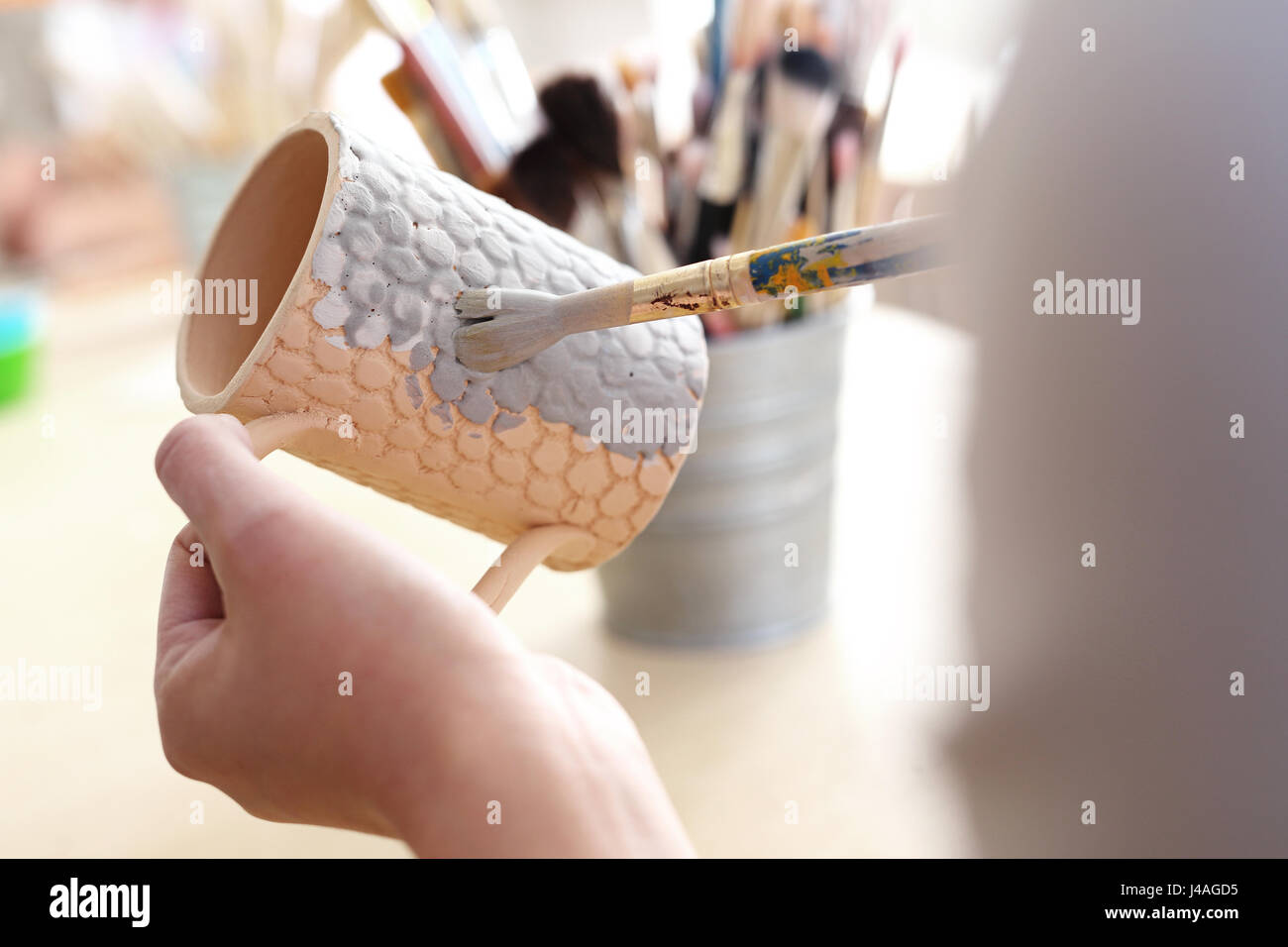 Artistic ceramics. Handicraft. Decoration of ceramics Stock Photo - Alamy