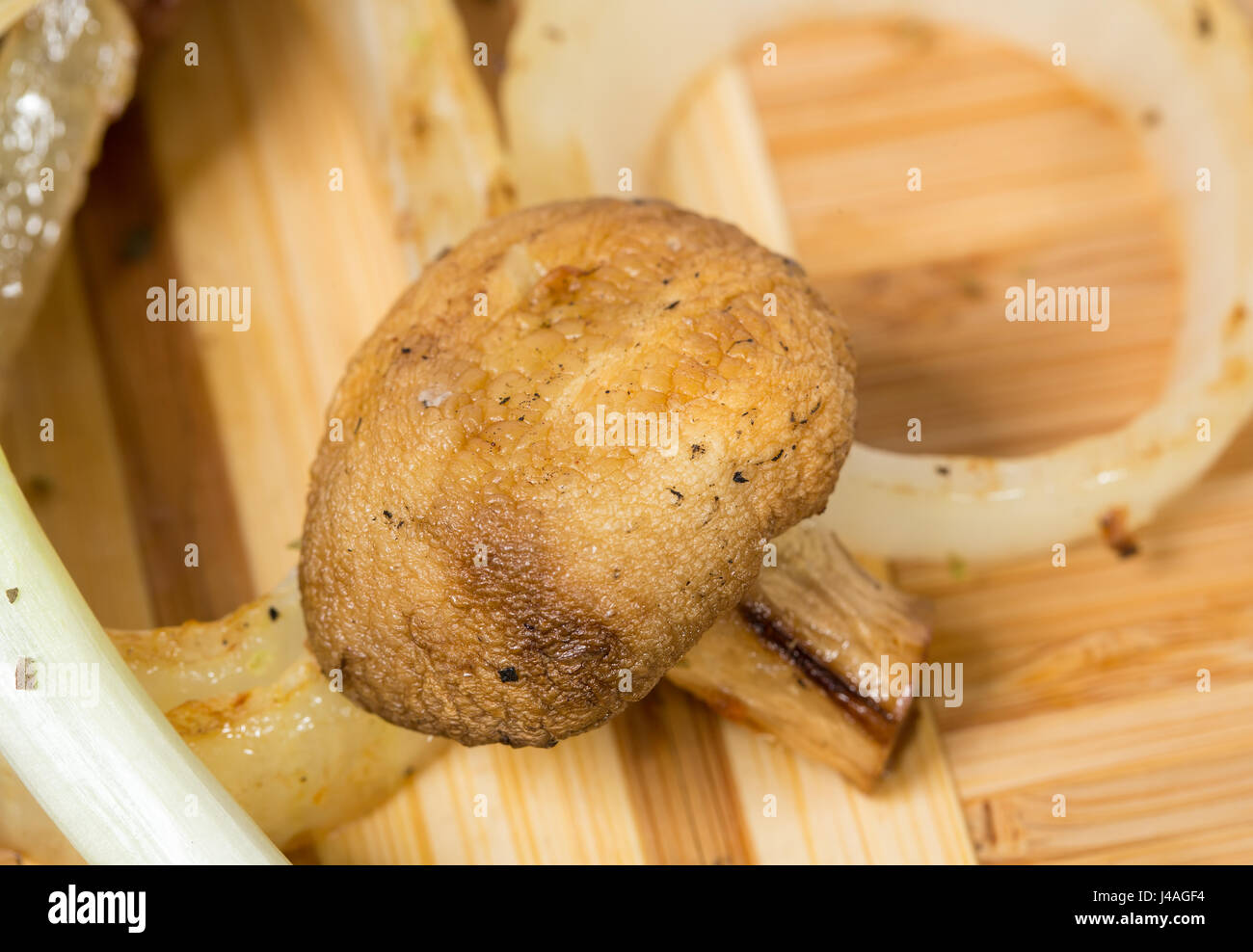 Grilled vegetables closeup as a garnish for meats platter. Macro. Photo ...