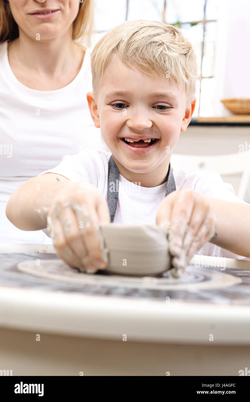 Children modeling clay hi-res stock photography and images - Alamy