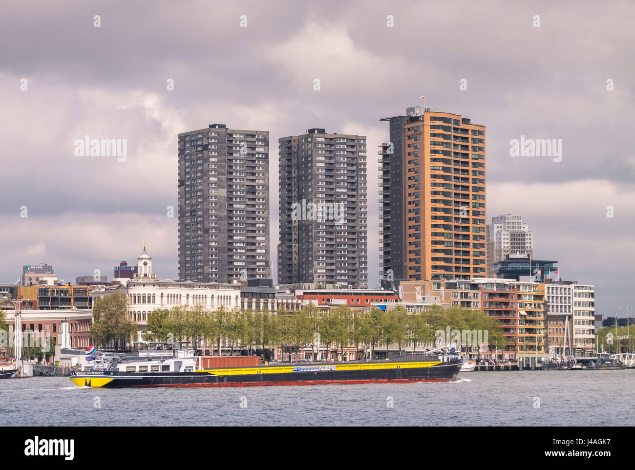 Mix of modern and traditional architecture along the Maas river ...