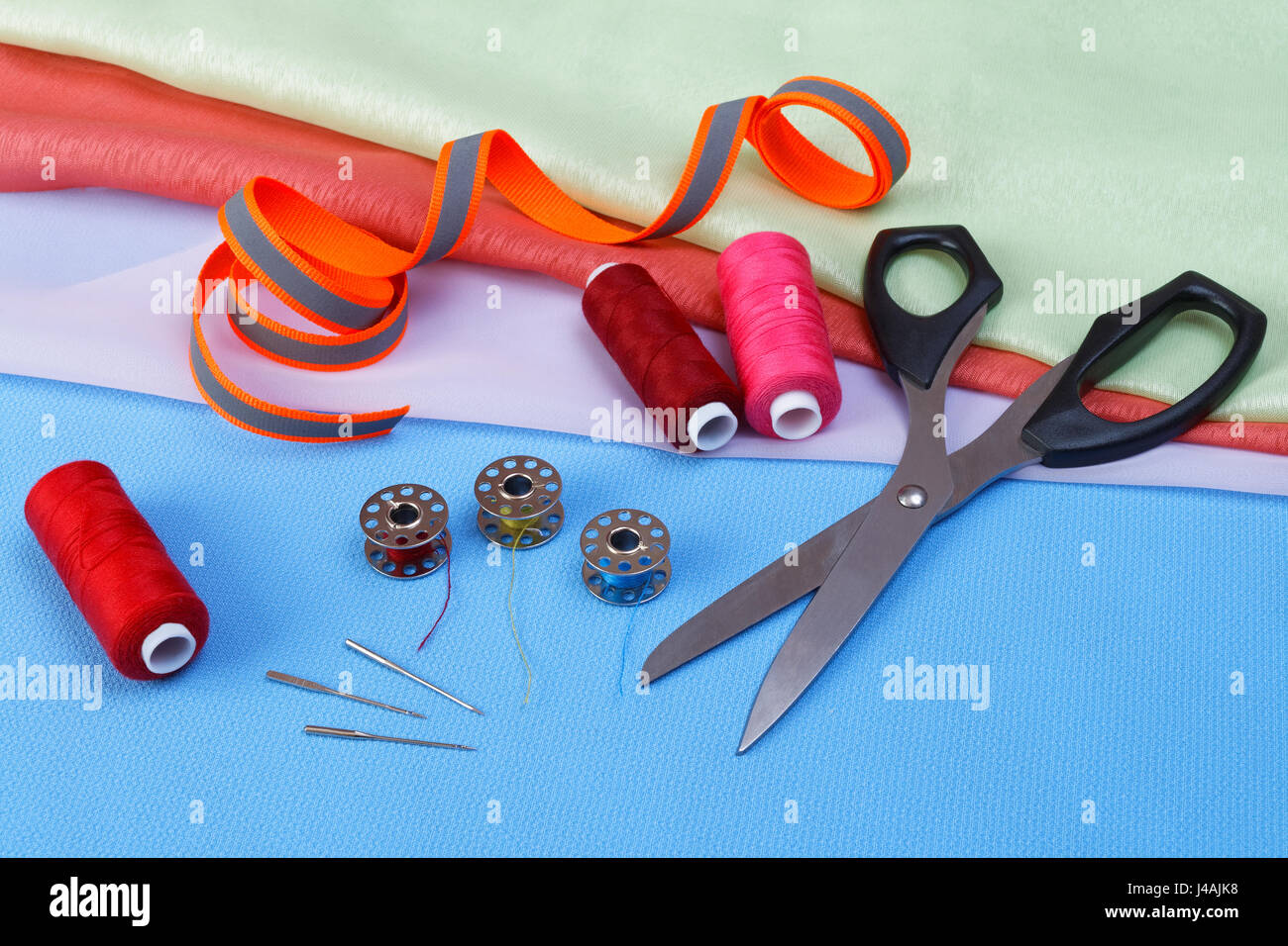 Various accessories for sewing on a sewing machine on a cloth ...