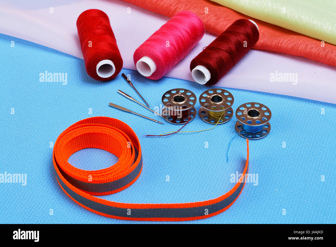 Various accessories for sewing on a sewing machine on a cloth ...