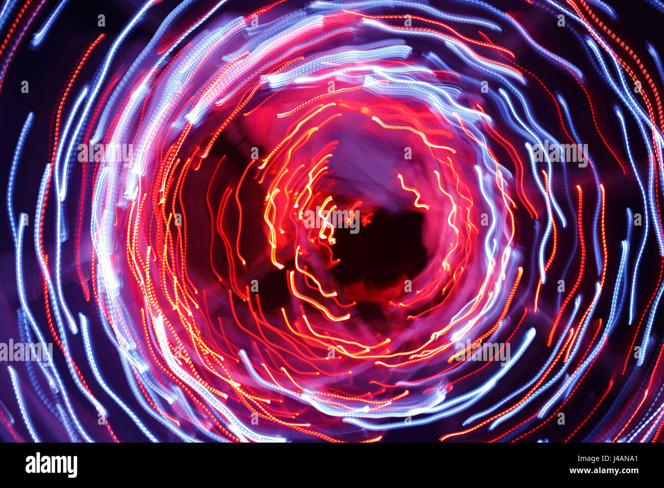 Abstract background of light trails with circular rotation, which was ...