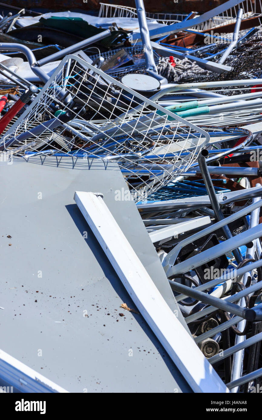A pile of scrap metal waiting to be recycled Stock Photo - Alamy