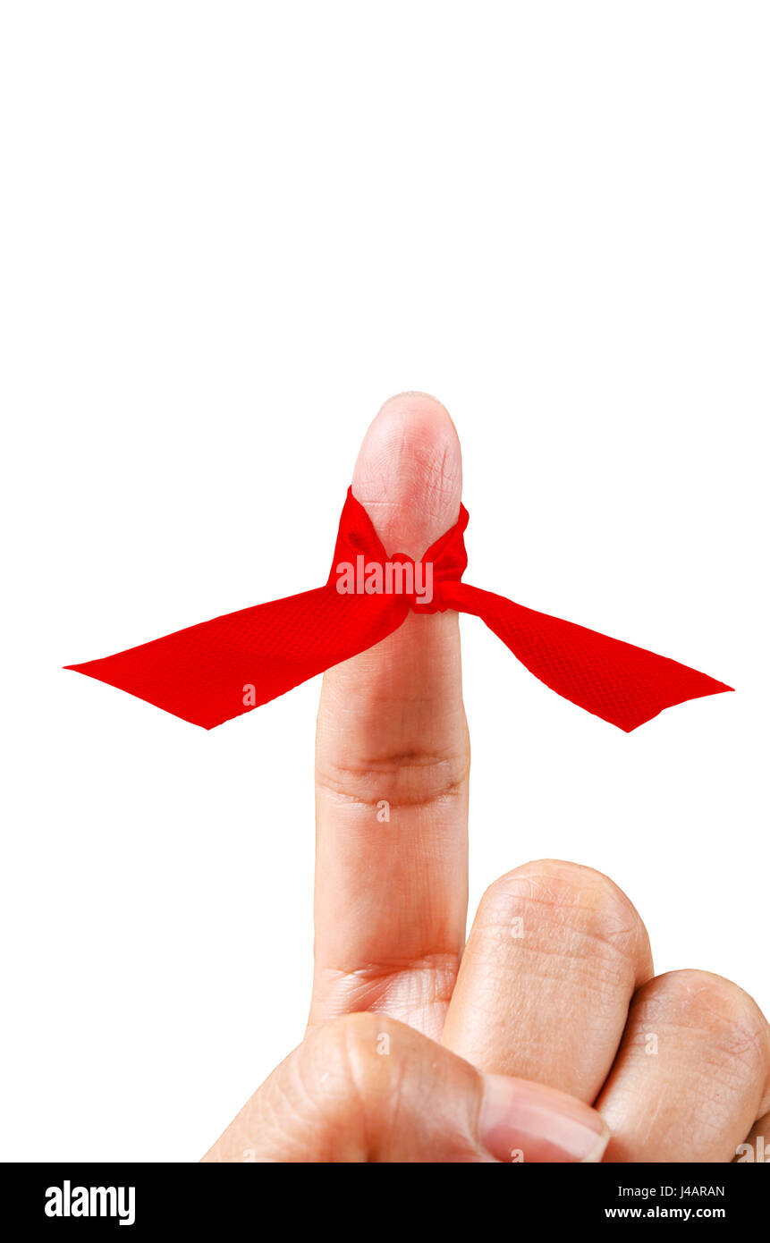 Red ribbon on finger isolated on white background, Save clipping path ...