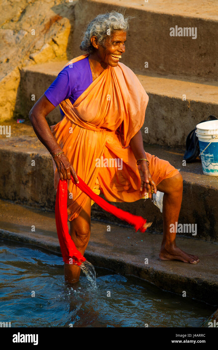Indian people washing clothes at Tungabhadra Canal, Hospet, India Stock ...