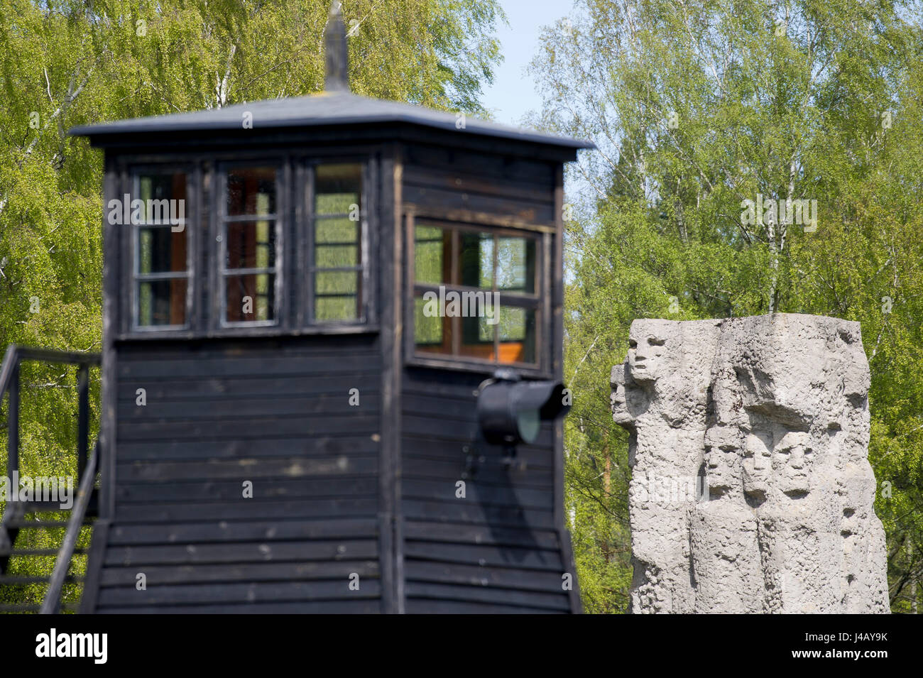 Wooden guard tower and the Memorial of Victims of Nazi German ...