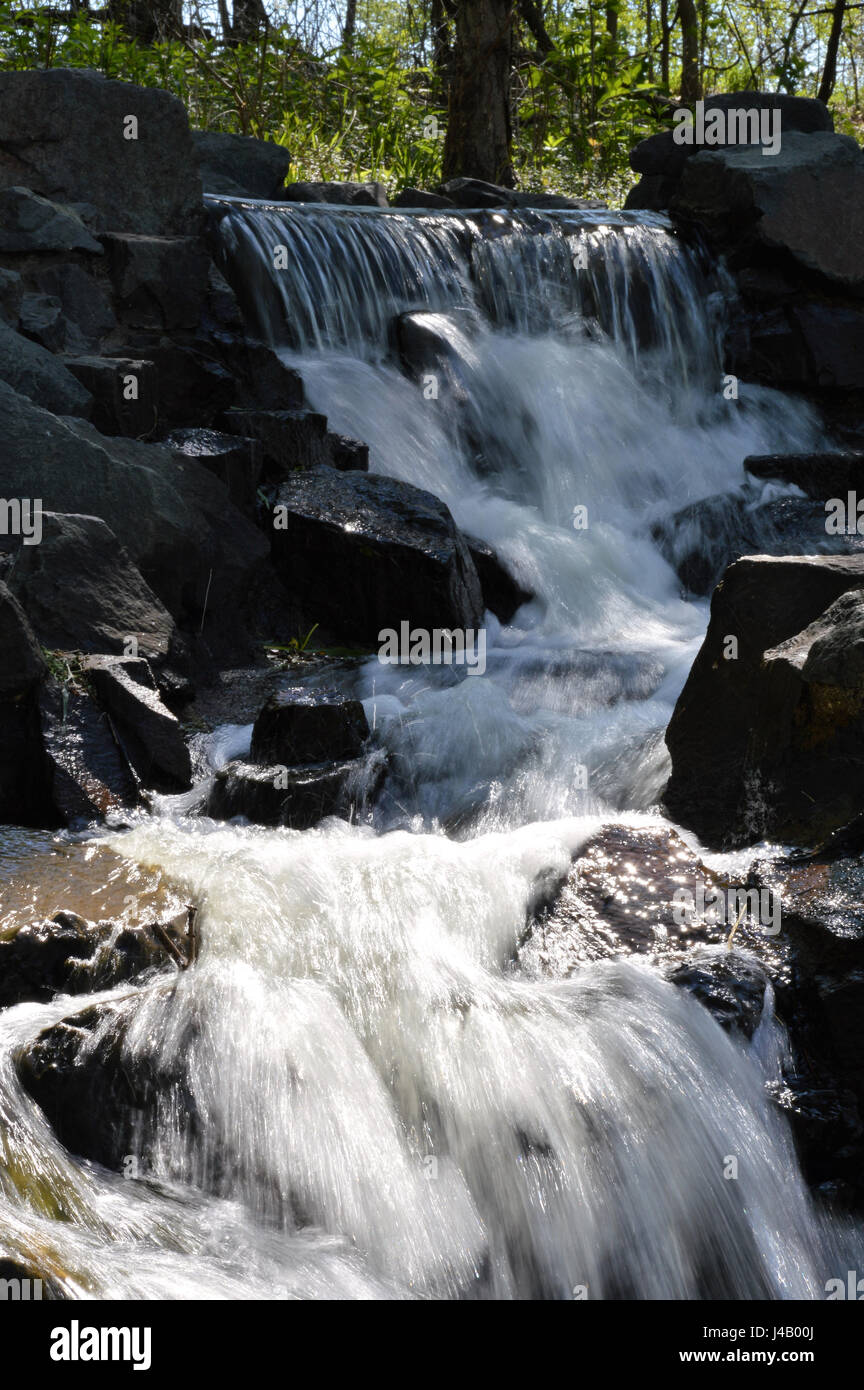 Waterfall at the park Stock Photo - Alamy