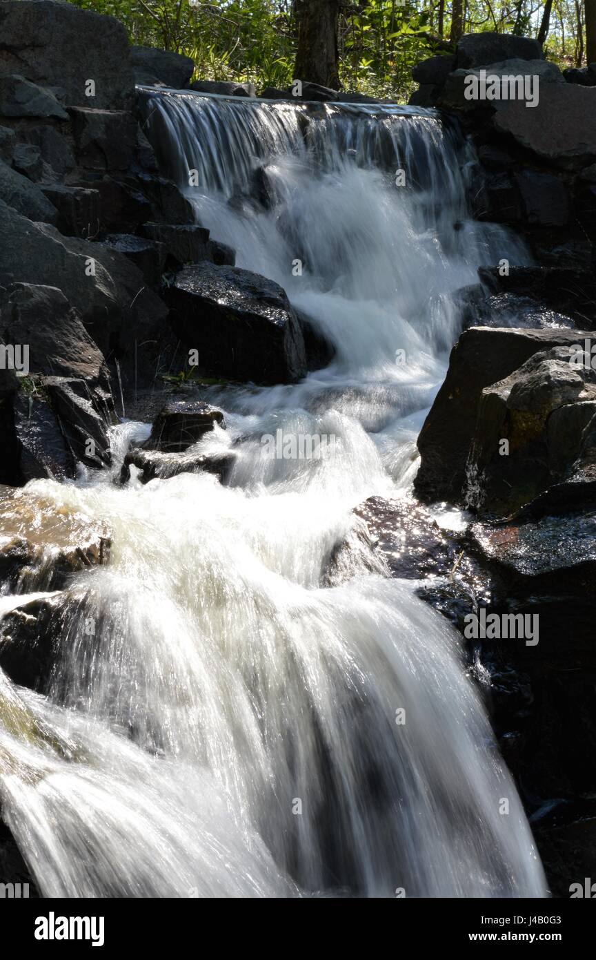 Waterfall at the park Stock Photo - Alamy