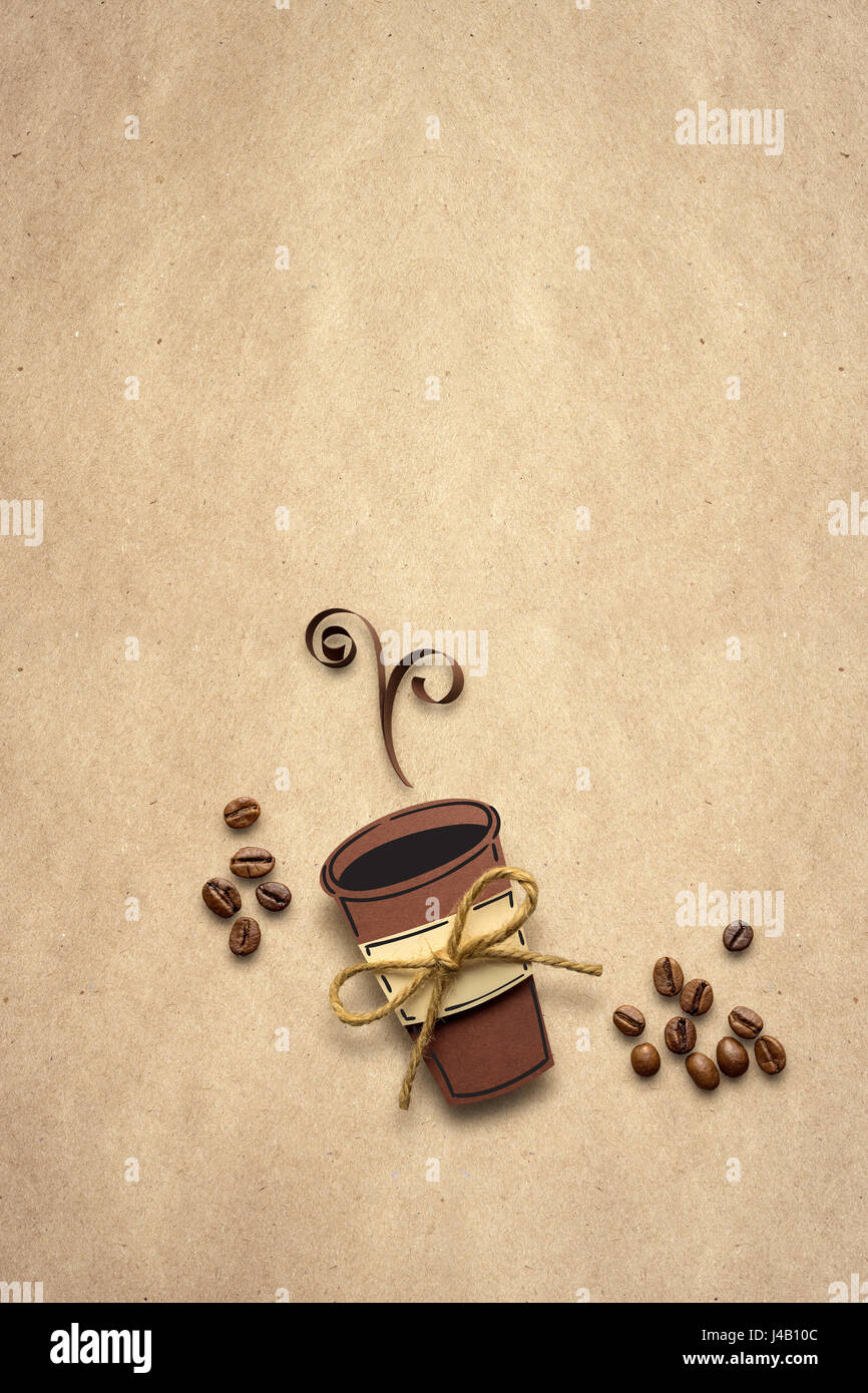 Creative concept photo of a cup of coffee made of paper on brown ...