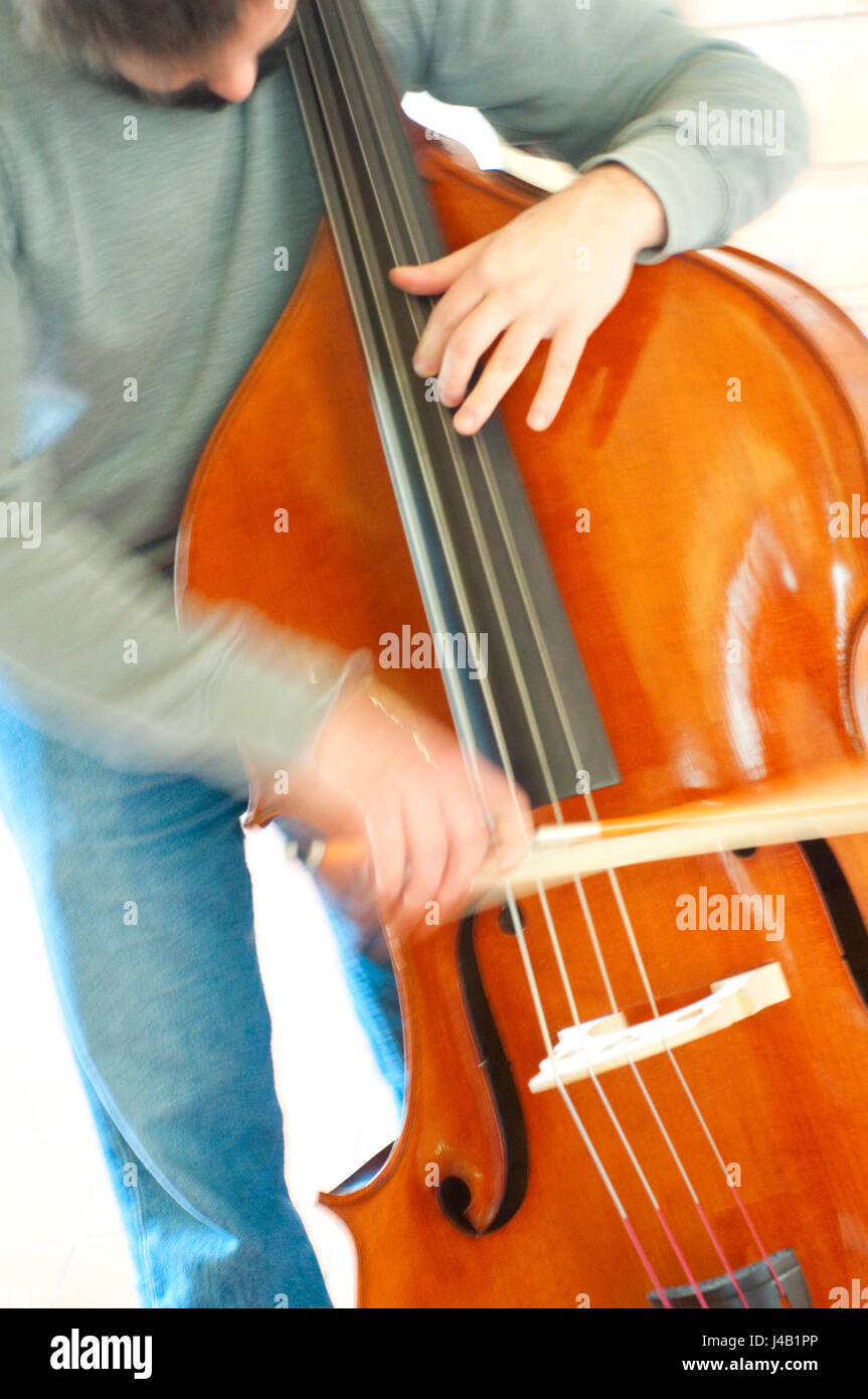 Old man plays the contrabass hi-res stock photography and images - Alamy