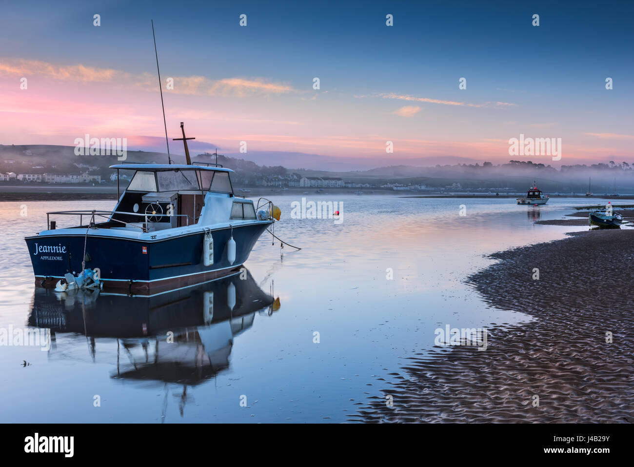Mist rolls across the North Devon village of Instow as dawn breaks over ...
