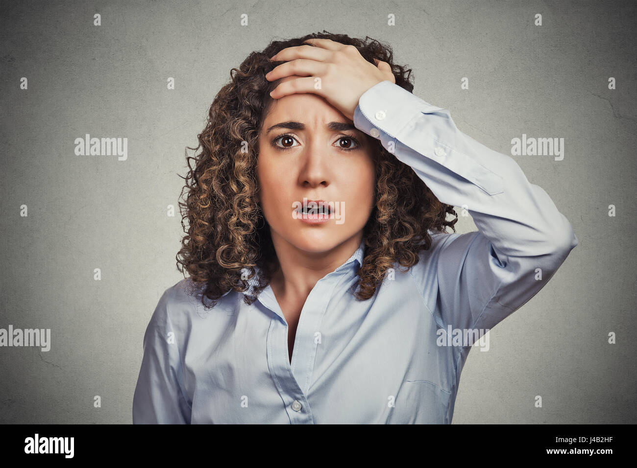 Closeup portrait headshot terrified young business woman looking ...