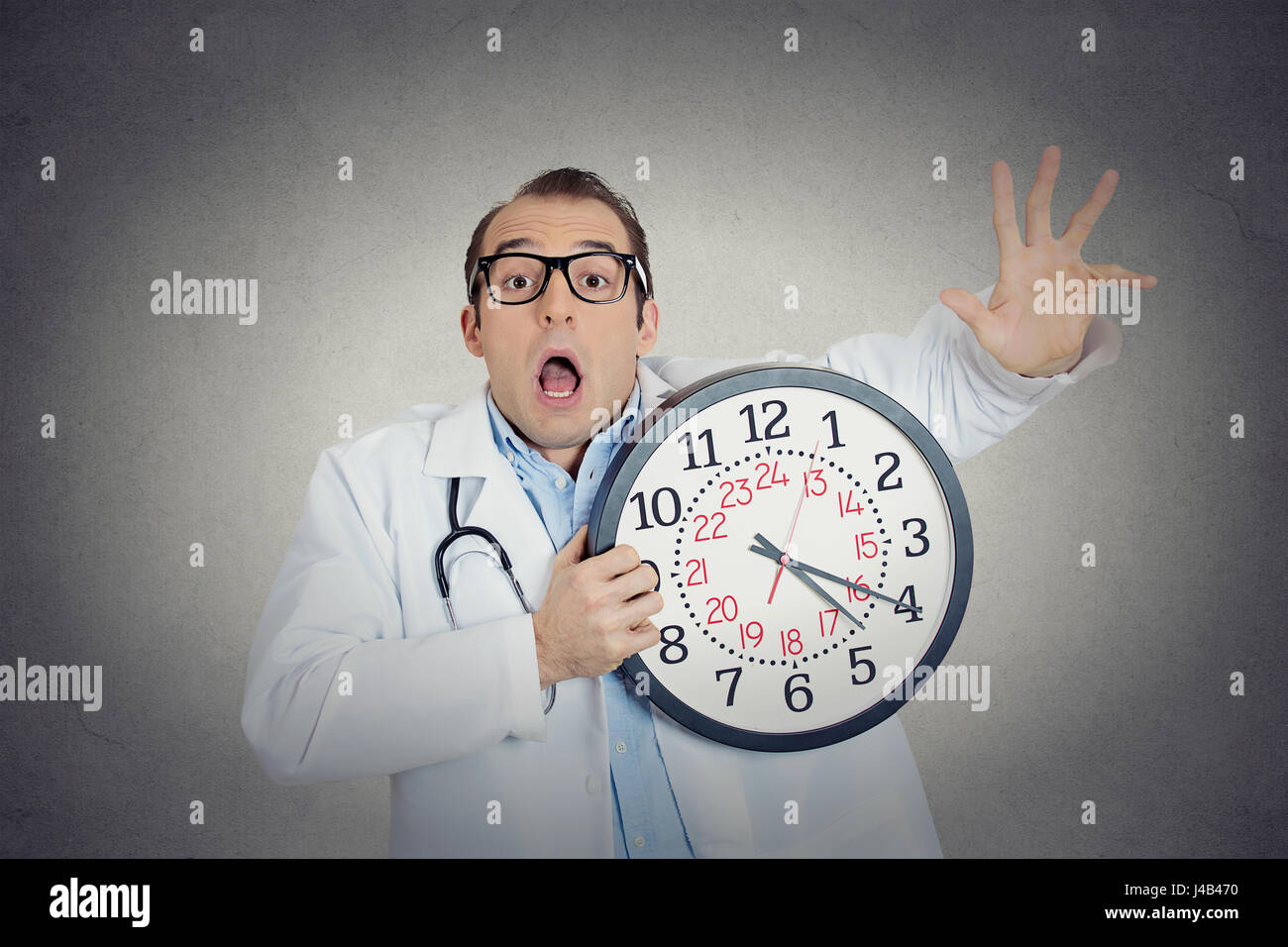 stressed man with clock Stock Photo - Alamy