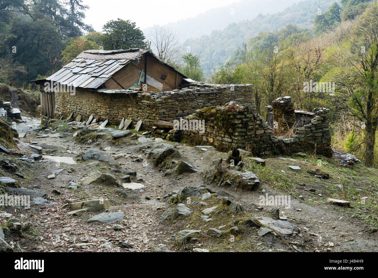 Ancient stone house on the rocky trail between Ghorepani and Ulleri ...