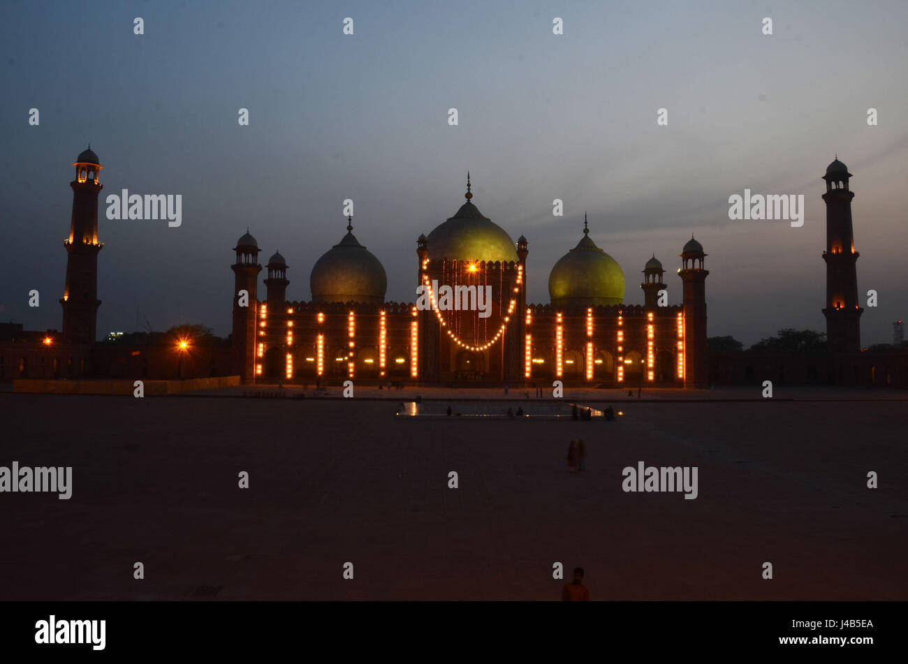 A splendid view of historical Badshahi mosque decorated with colorful ...