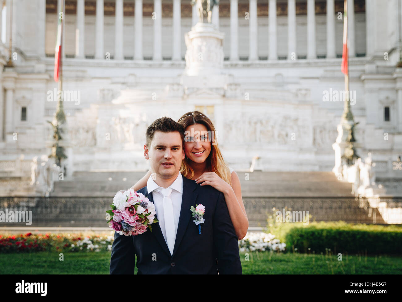 Bride and groom wedding poses in front of Altar of the Fatherland ...