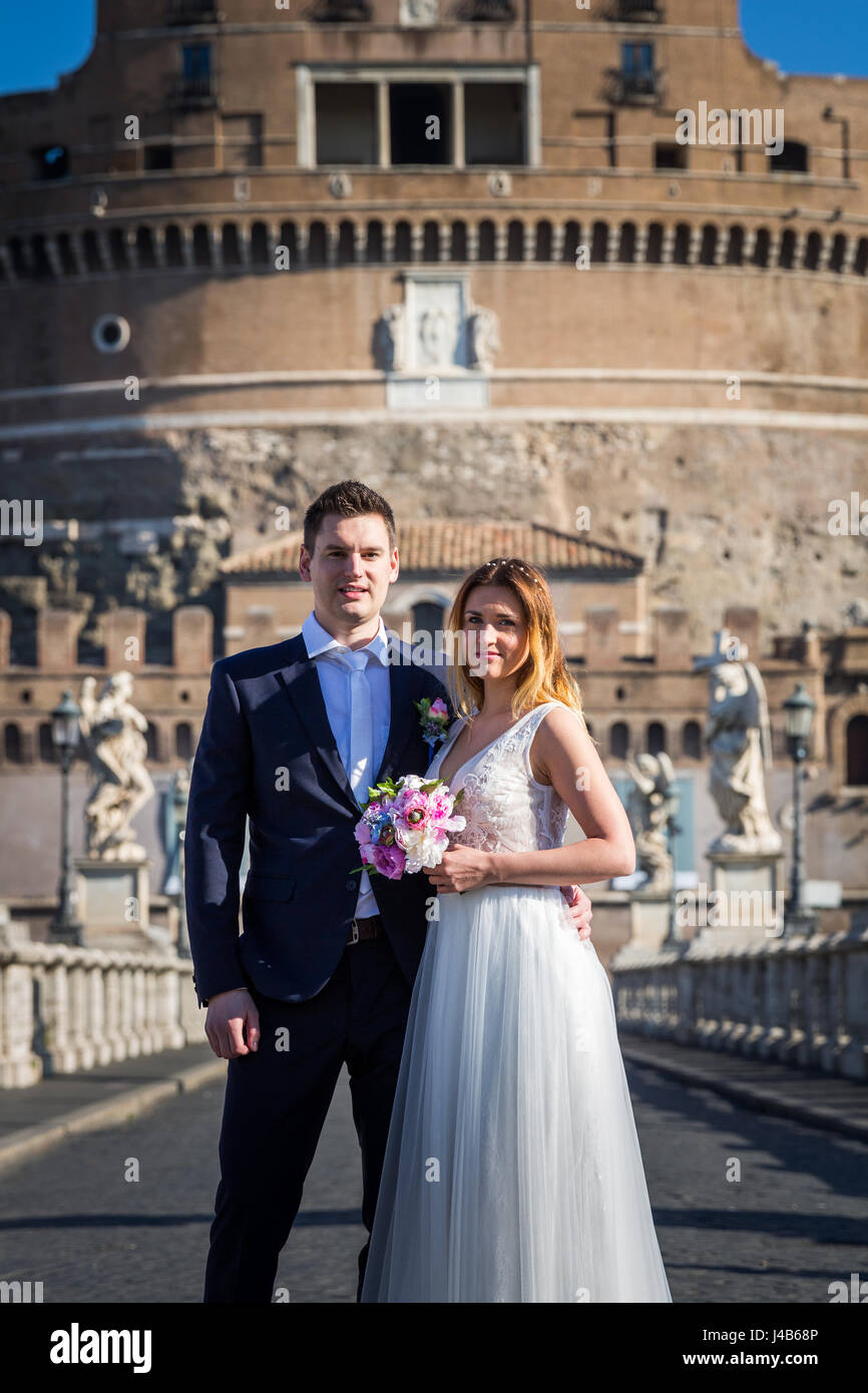 Wedding couple in front castle hi-res stock photography and images - Alamy