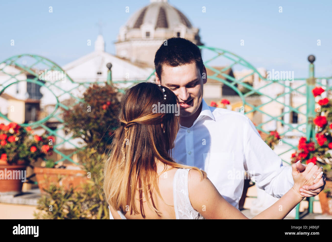 Bride and groom dancing on the terrace, Rome, Italy Stock Photo - Alamy