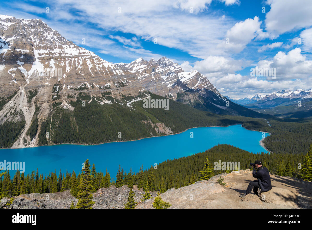 Man photographing Peyto Lake, Banff National Park, Alberta, Canada ...