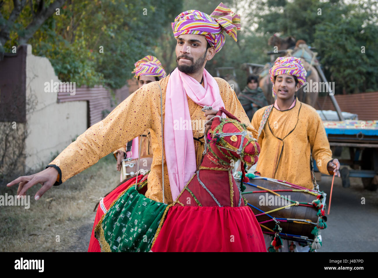 Indian men playing drums and dancing in the streets Stock Photo - Alamy