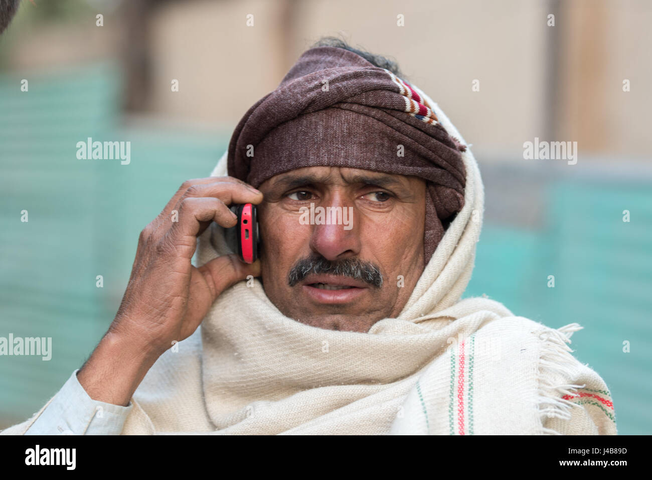 Indian man on a cellphone Stock Photo - Alamy