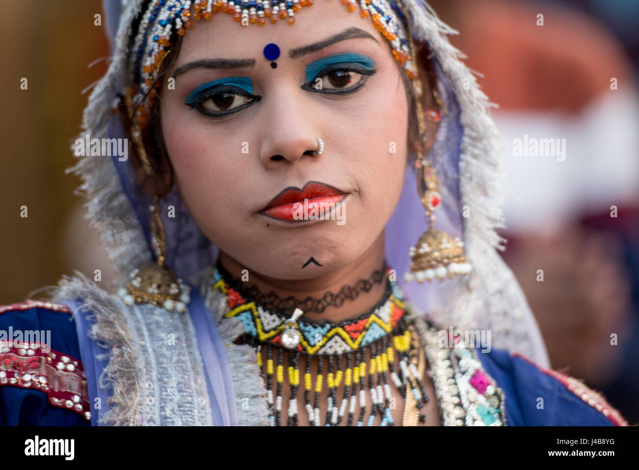 Indian woman in decorative head dress Stock Photo - Alamy