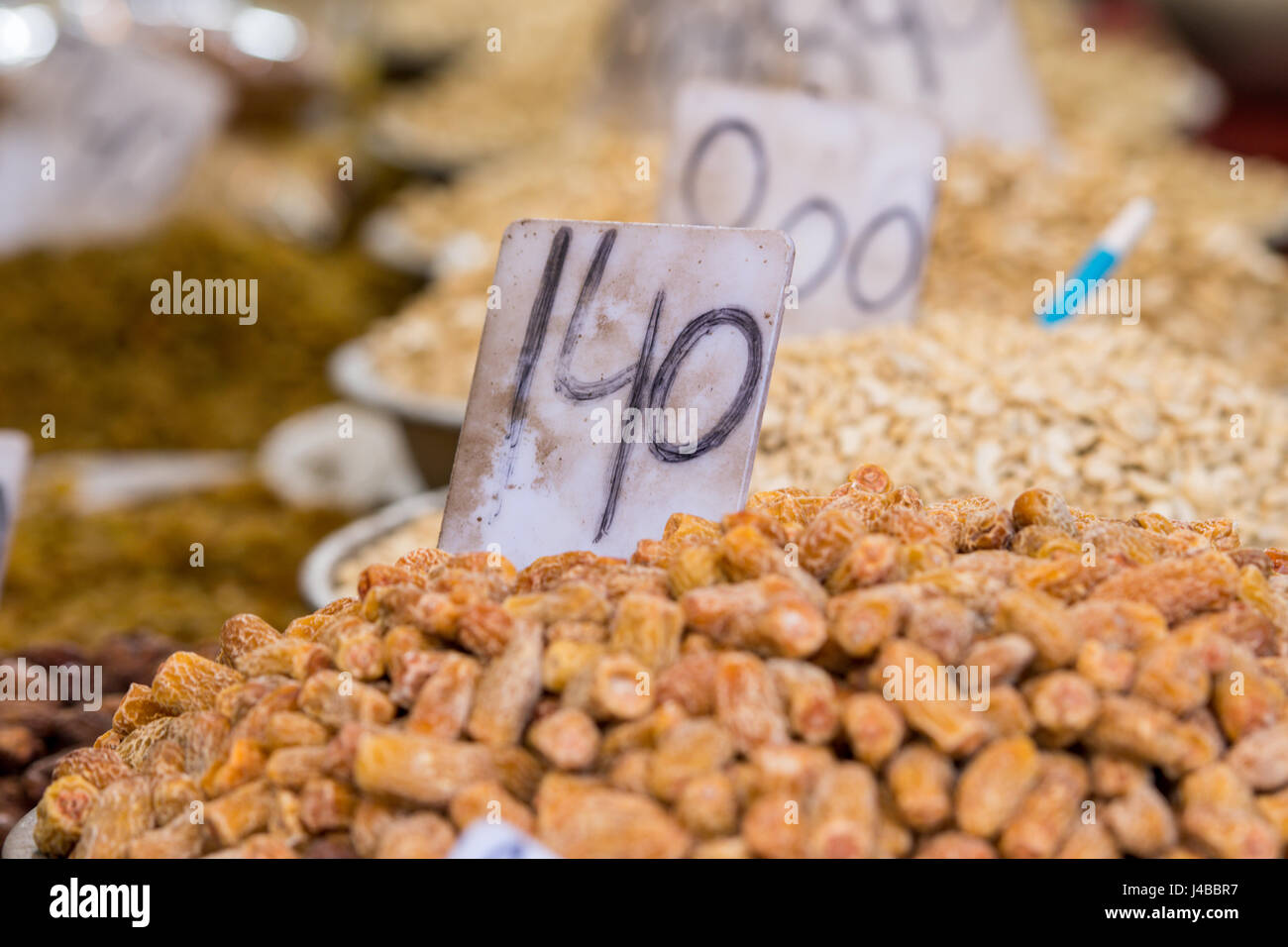 Various nuts and spices on display at the market on Khari Baoli Road in ...