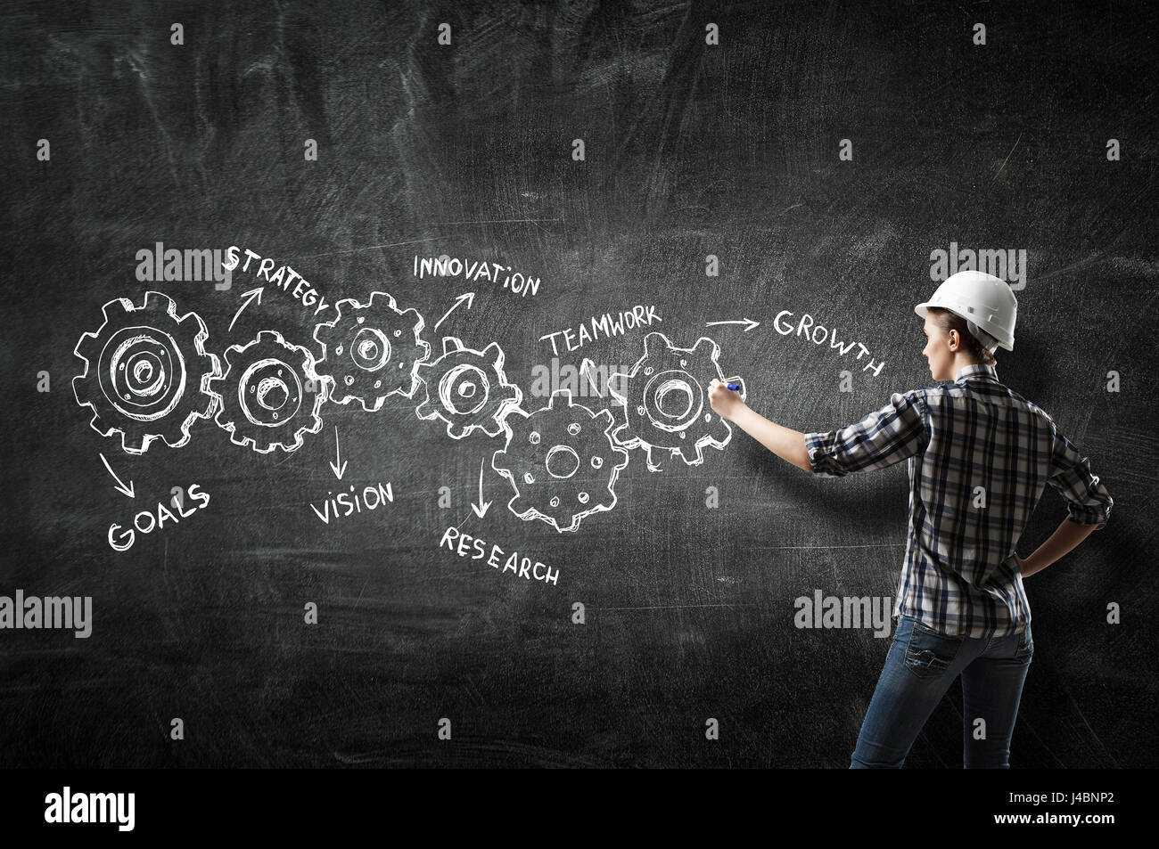 Builder woman sketching project Stock Photo - Alamy