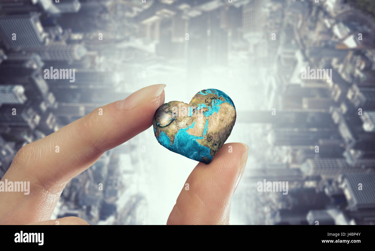 Whole world in hand Stock Photo - Alamy