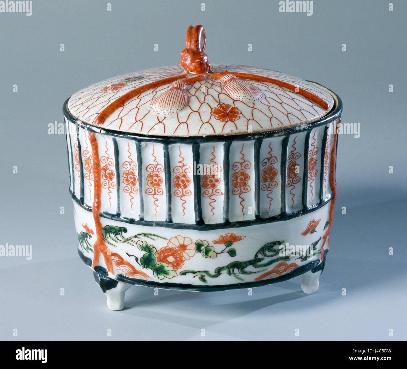 This artifact, a pot with a lid, is housed in the Rijksmuseum ...