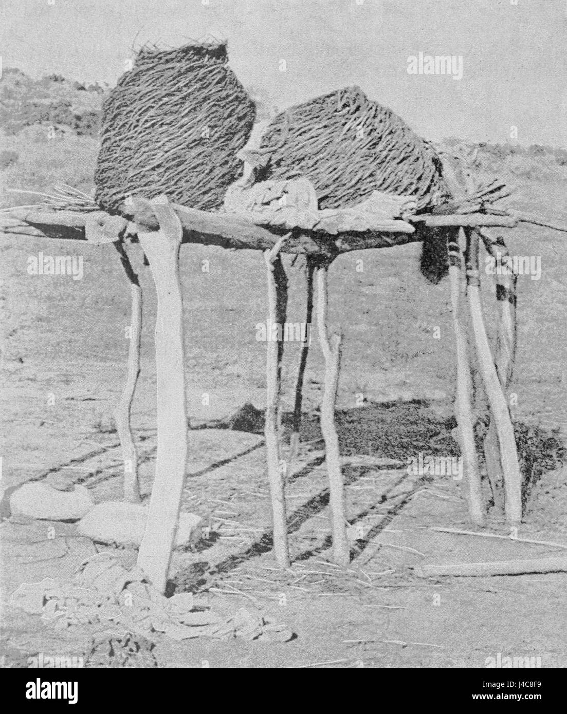 This image depicts traditional Aboriginal granaries, made from willow ...