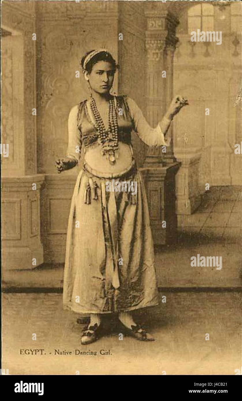 This vintage postcard depicts a native Egyptian dancing girl ...