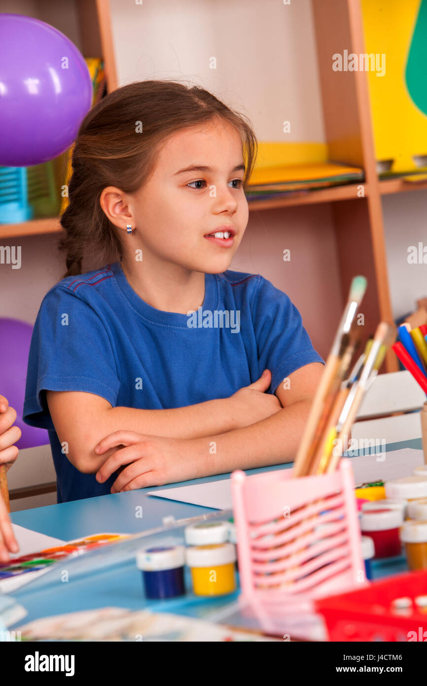 Small students girl painting in art school class Stock Photo - Alamy