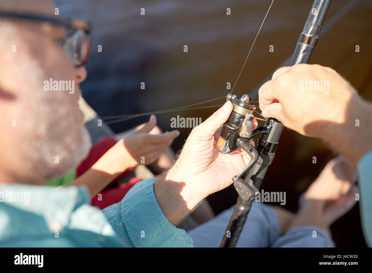 Old man with rod hi-res stock photography and images - Alamy
