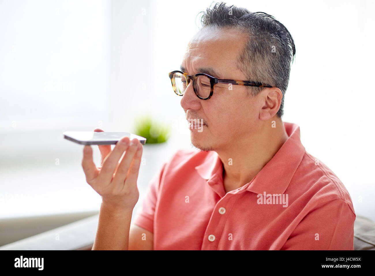 man using voice command recorder on smartphone Stock Photo - Alamy