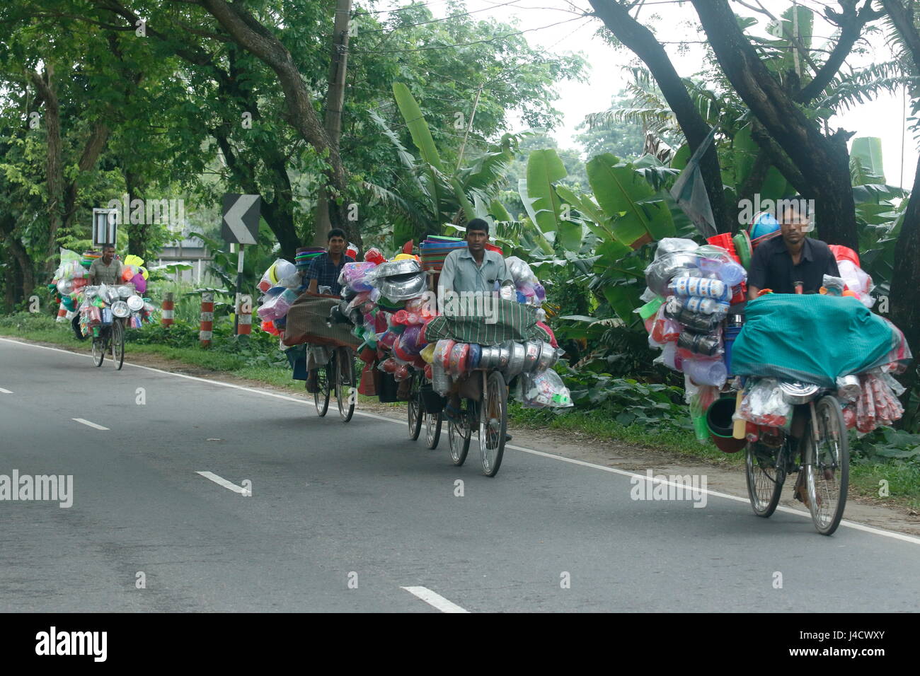 Vendor on bicycle hi-res stock photography and images - Alamy