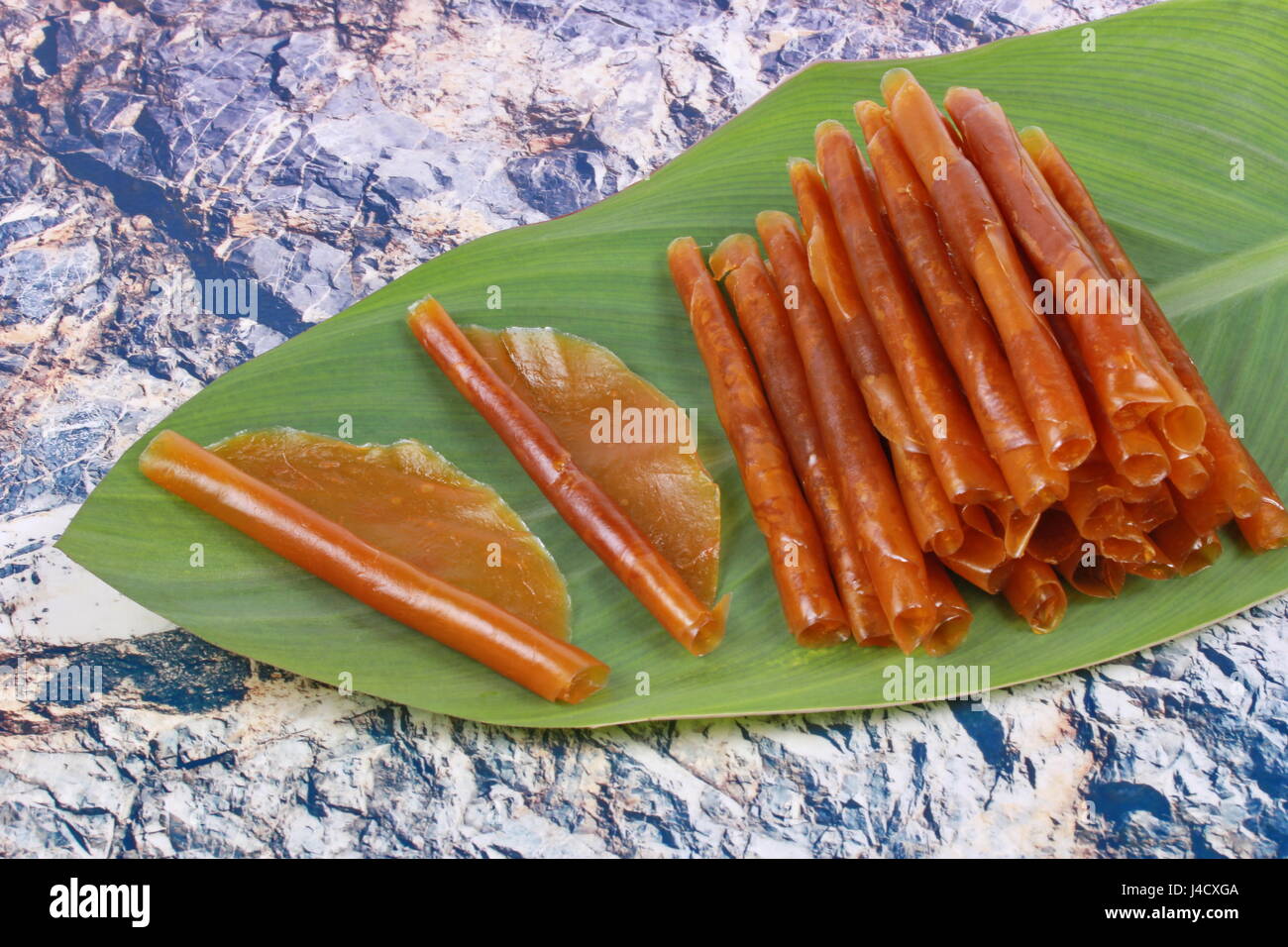Thai dessert ,Dried mango paste roll ,Mango stir fry , Mango sheet , on ...