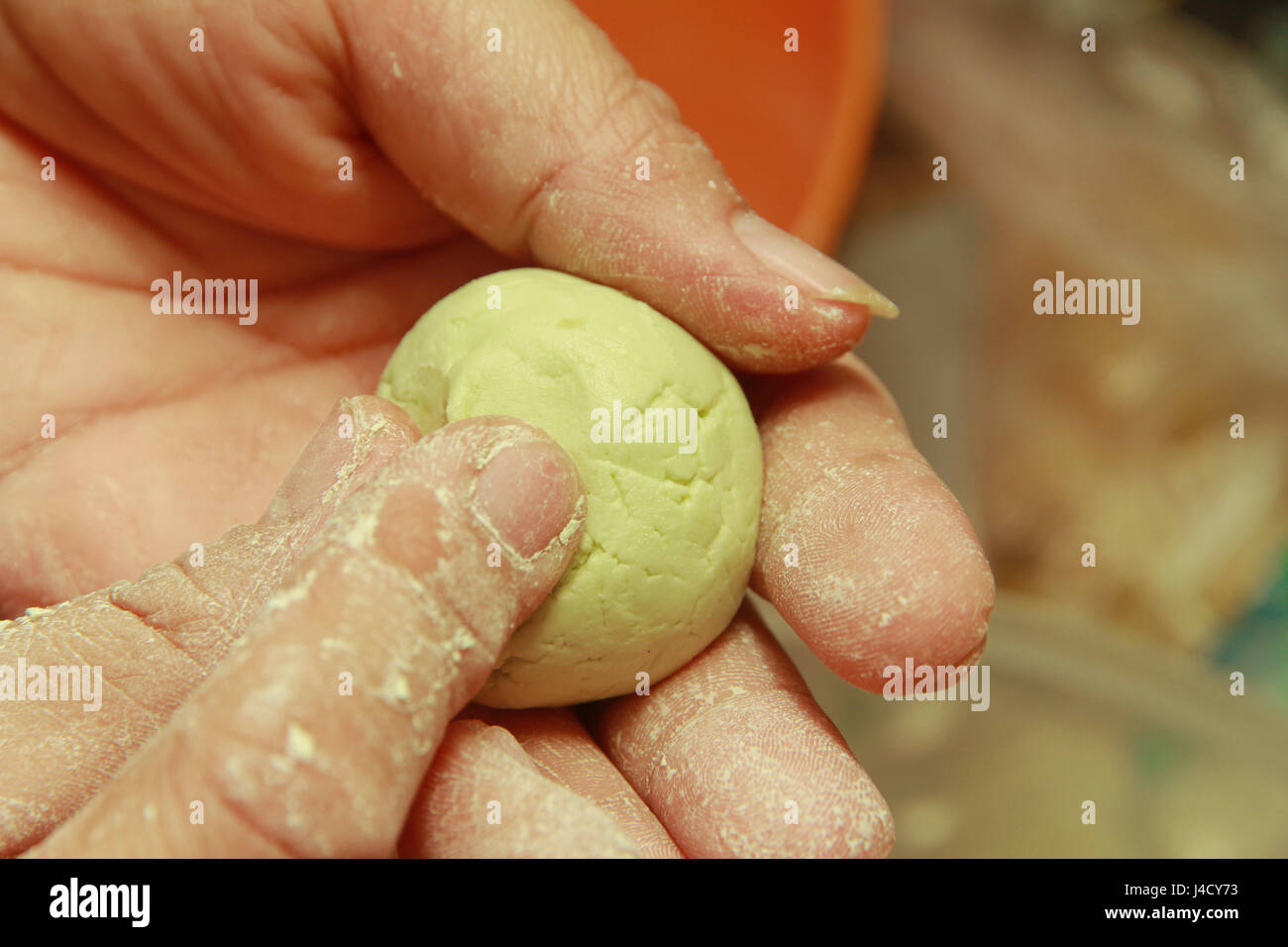 Homemade cooking Khanom Tom in Thai , Knead the dough to wrap the sweet ...