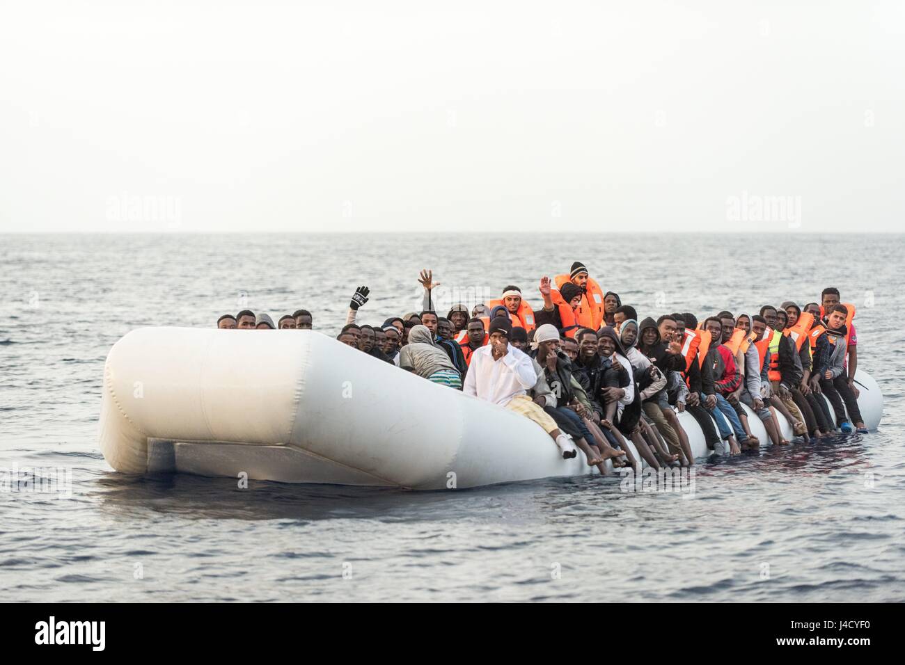 Approximately 380 refugees in a wooden boat and 130 in a rubber boat ...