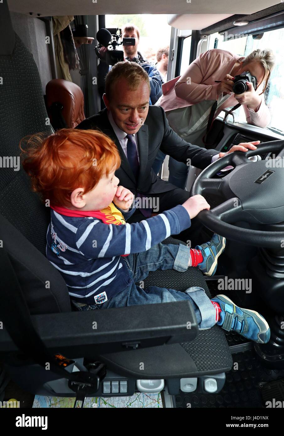 Alex Shimmin (left) takes control of the Lib Dem battlebus, after ...