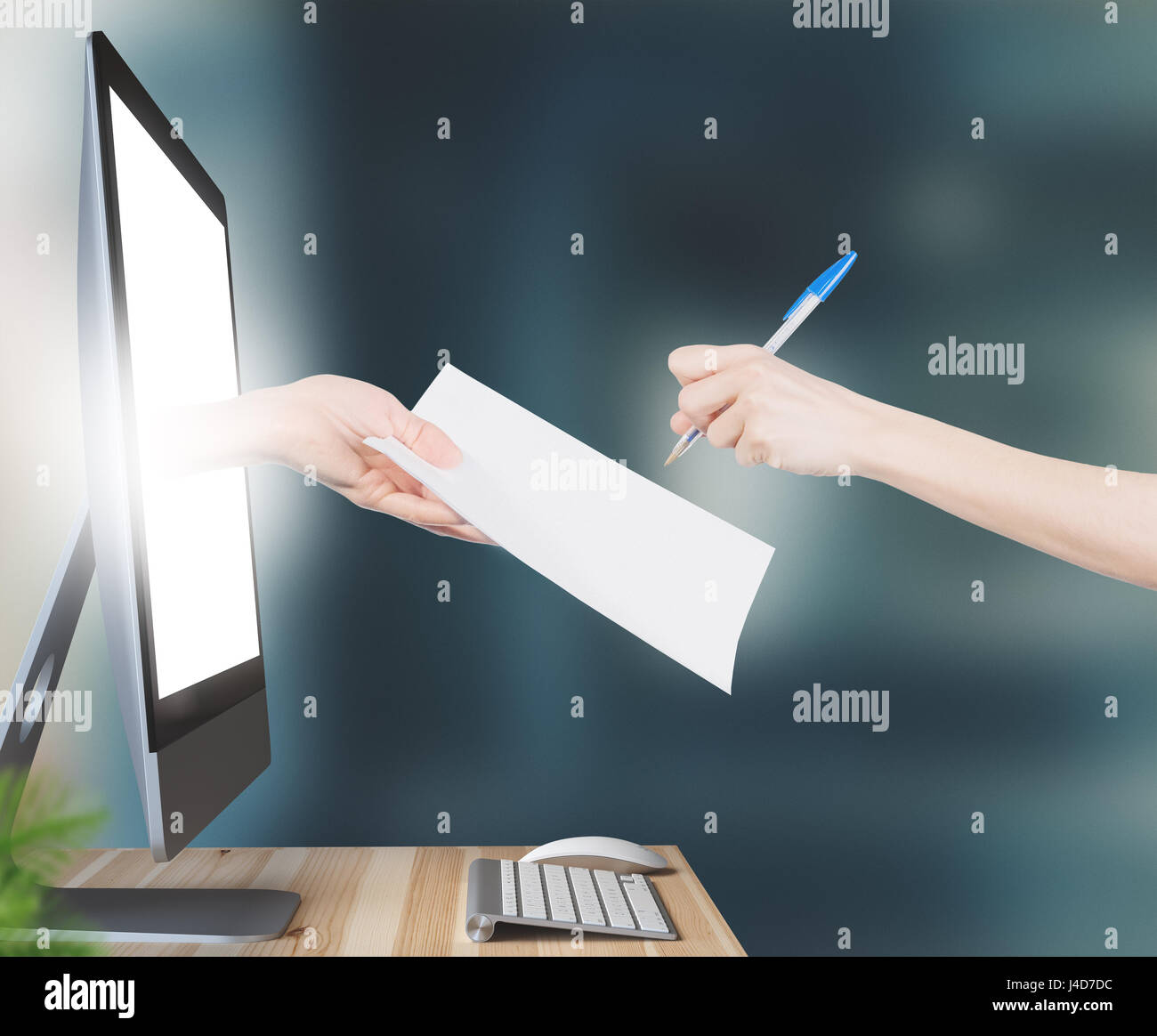 Hand with contract comes out of computer, signature Stock Photo - Alamy