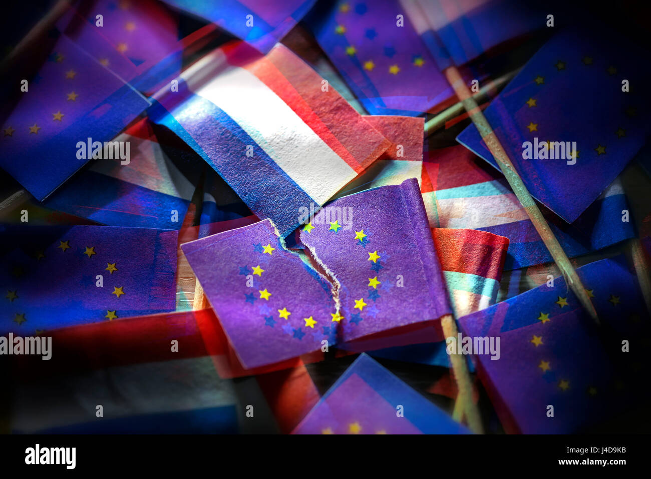 Torn flag of the EU and flags of the Netherlands, symbolic photo ...