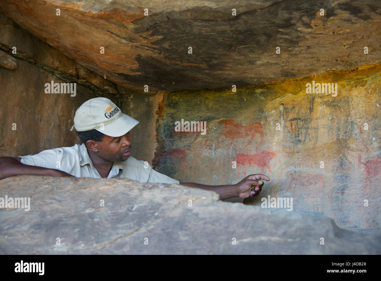 Guide showing San rock art Ganora Guest Farm near Nieu Bethesda Karoo ...