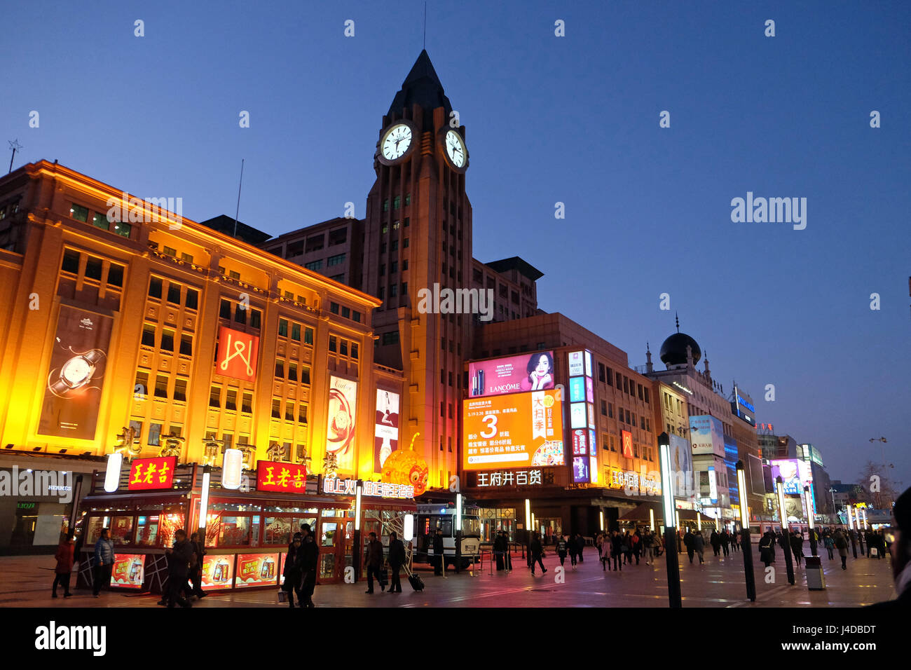 Clock tower on the shopping Wangfujing street in center of Beijing ...