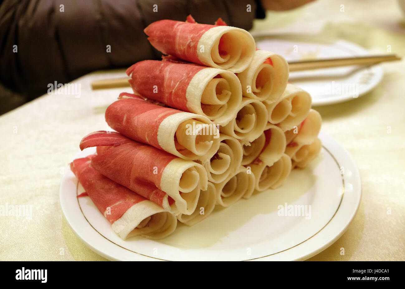 Mutton prepared for cooking in the hot pot, in Beijing, China, February ...