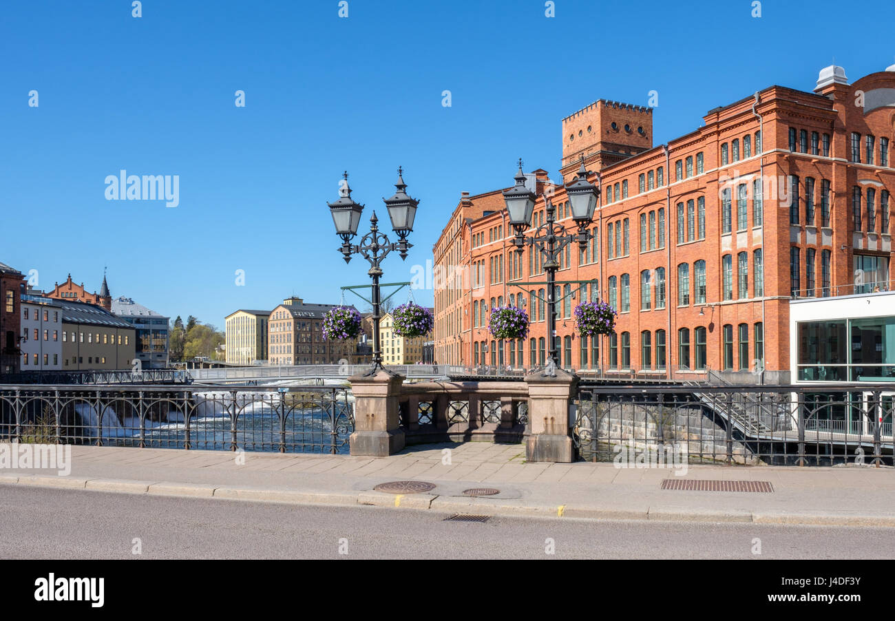 Motala river and the historic industrial landscape at springtime in ...