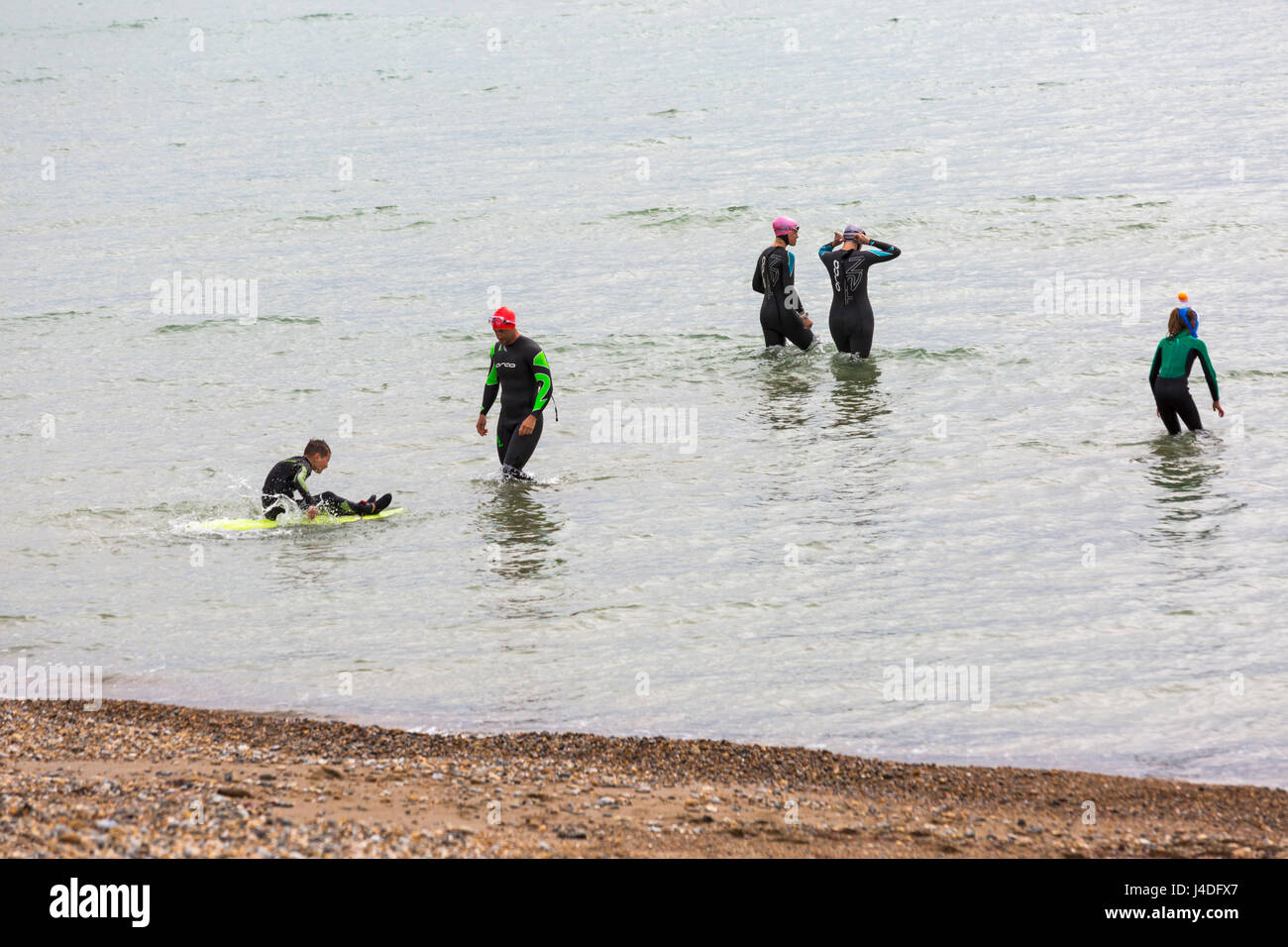Girl wearing wetsuit hi-res stock photography and images - Alamy