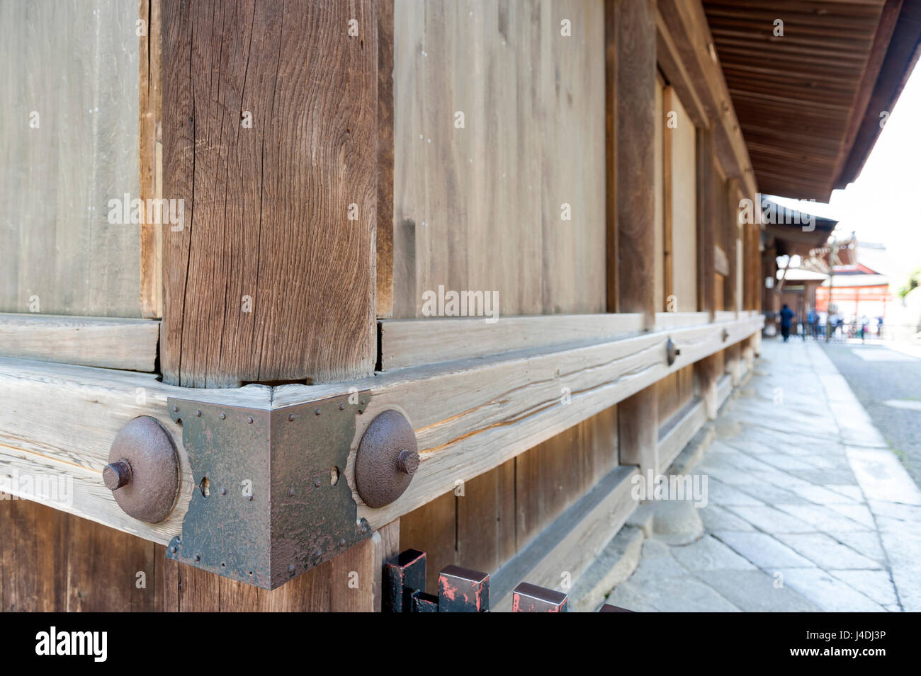 Traditional Japanese woodworking mitered butt joint supported by ...